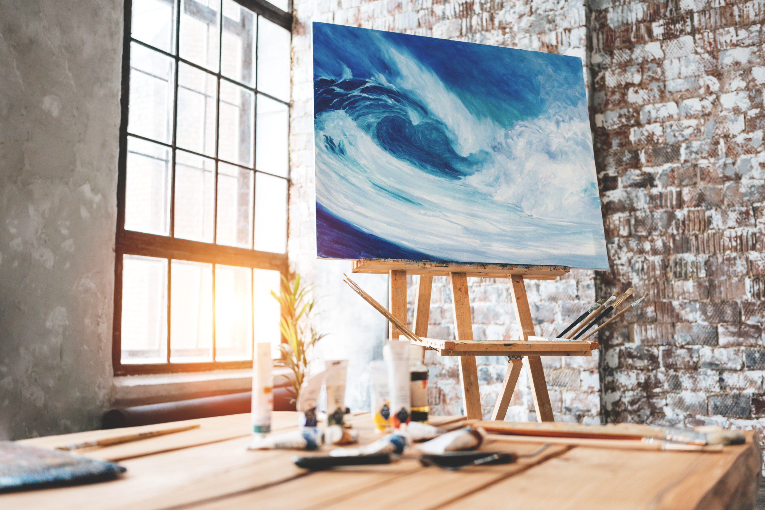 Art room. Artist workspace in painter studio. Painting on an easel ...